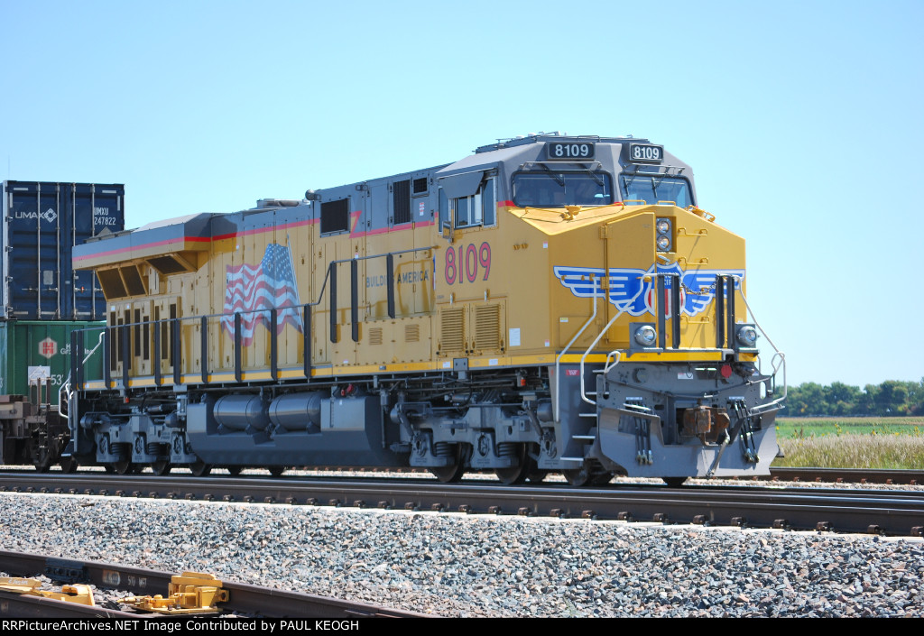 UP 8109 the Rear DPU on the Z PDG2 waits to pull east as the Mid Day Nebraska Sun Reflects Off ...